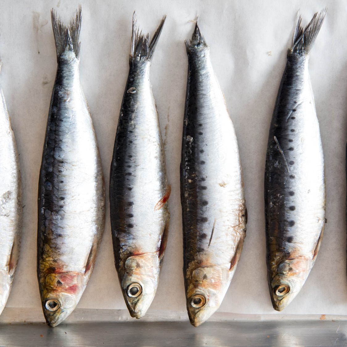 Are sardines cleaned before canning?