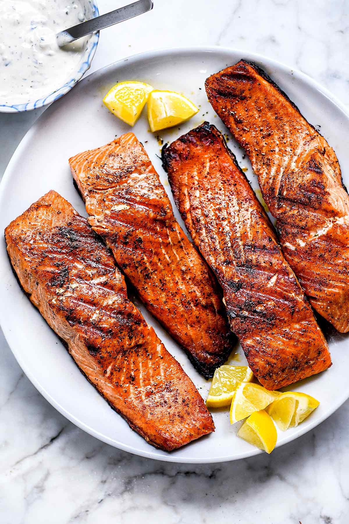 Are you supposed to flip salmon on the grill?