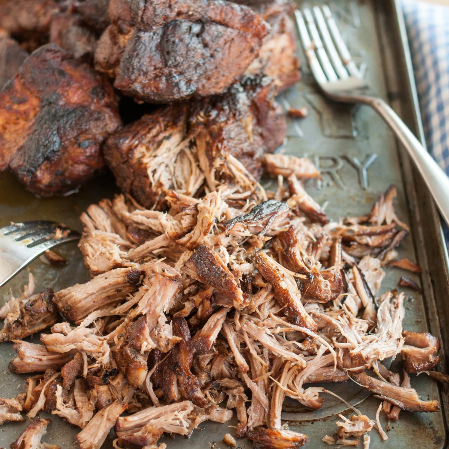At what temperature does pork shoulder pull?