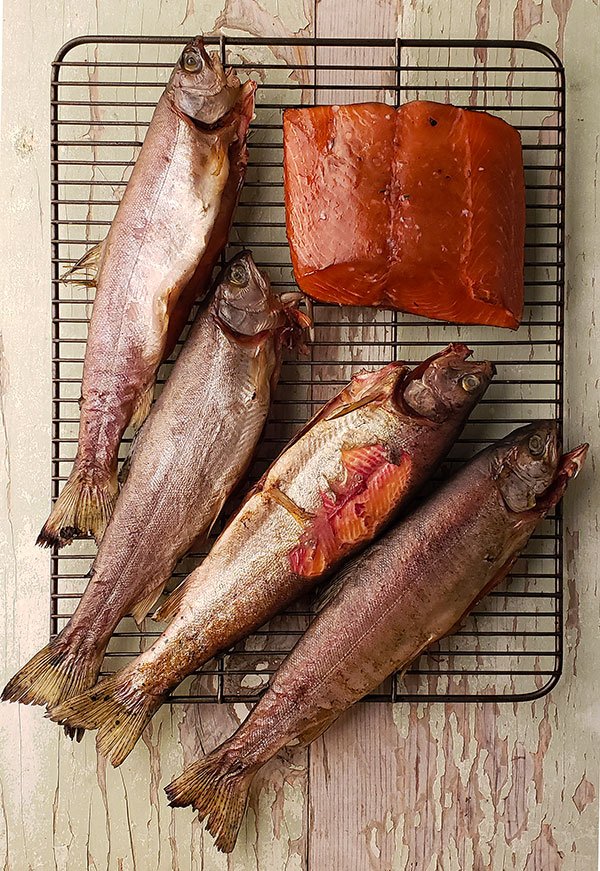 At what temperature is smoked trout done?