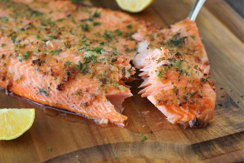 At what temperature is steelhead trout cooked?