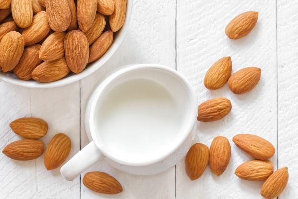 Can a person with gout drink almond milk?