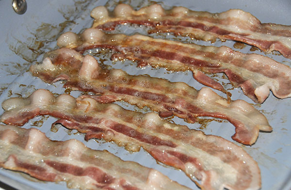 Can bacon be floppy and cooked?