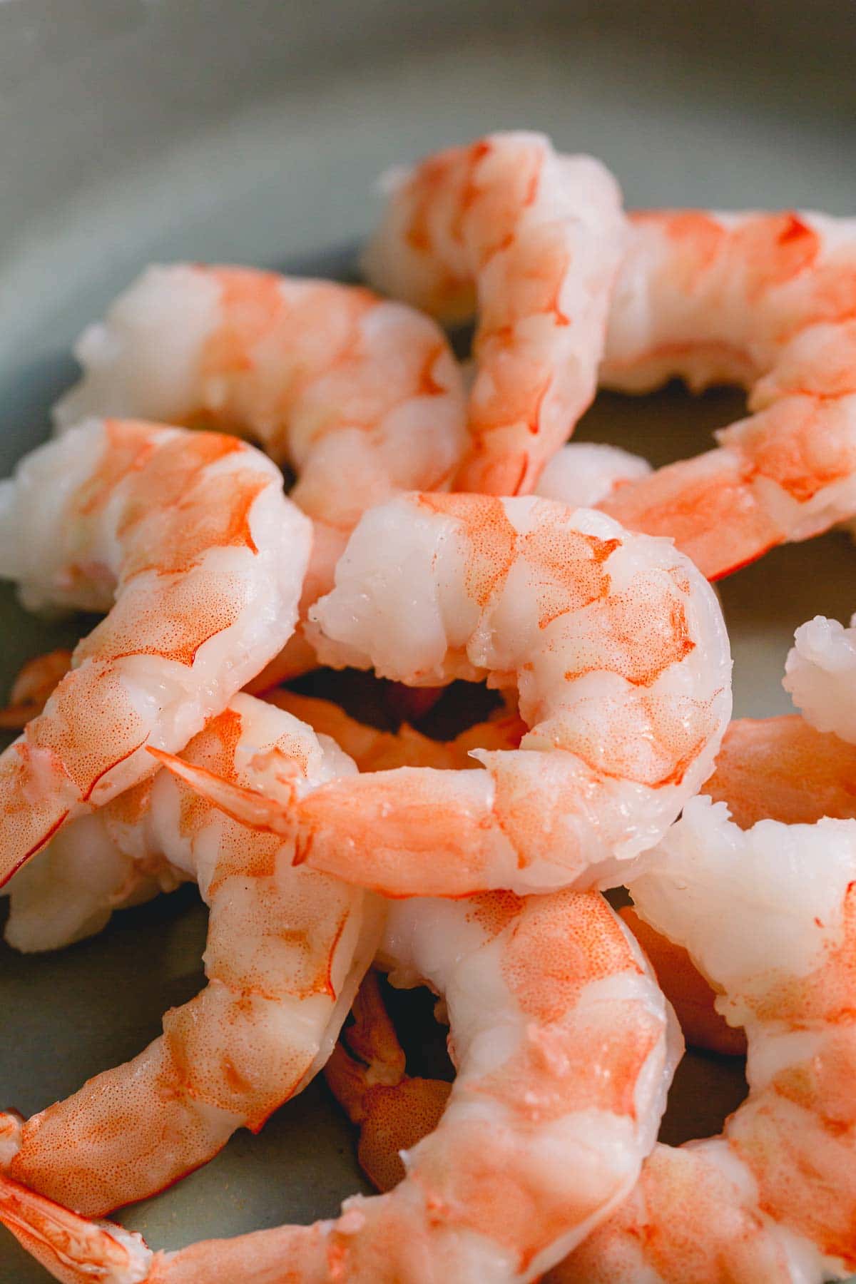 Can I boil already cooked frozen shrimp?