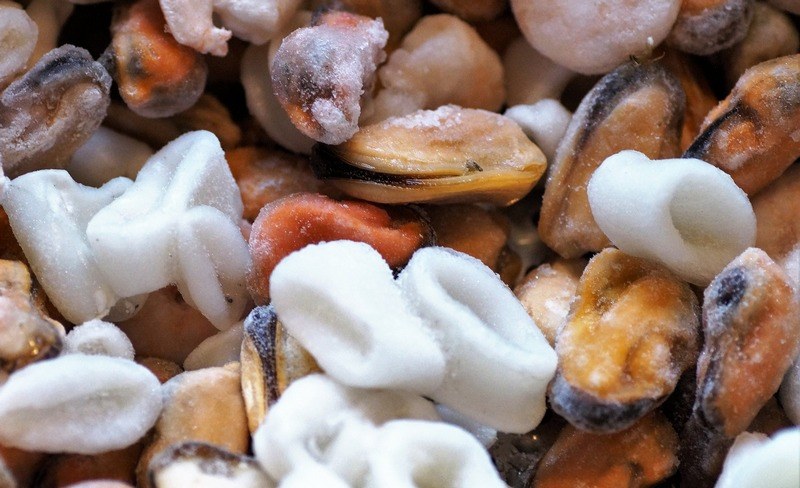 Can I cook frozen seafood mix without defrosting?