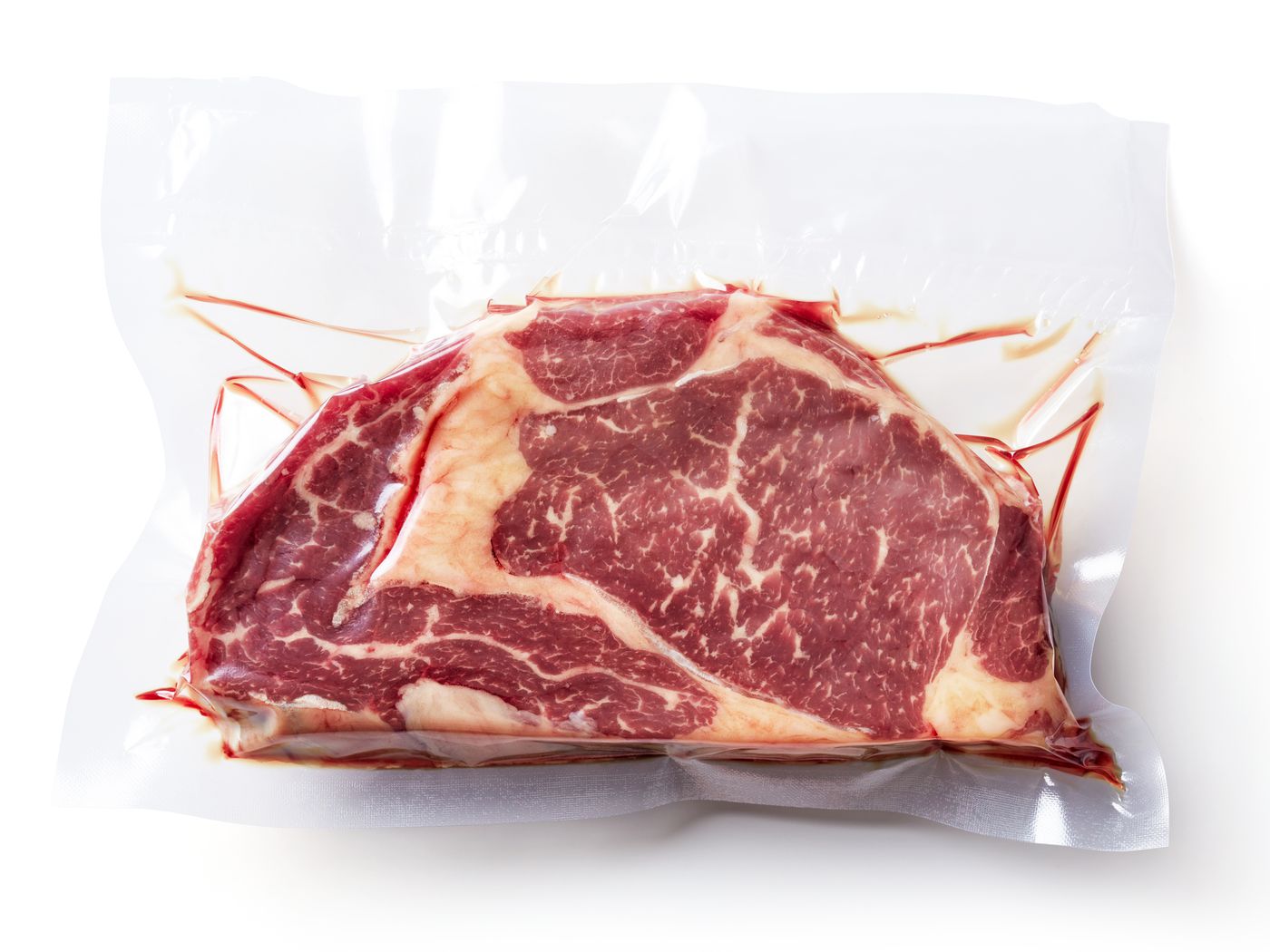 Can I defrost meat from a vacuum sealed bag?