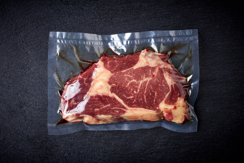 Can I defrost vacuum sealed meat in the microwave?