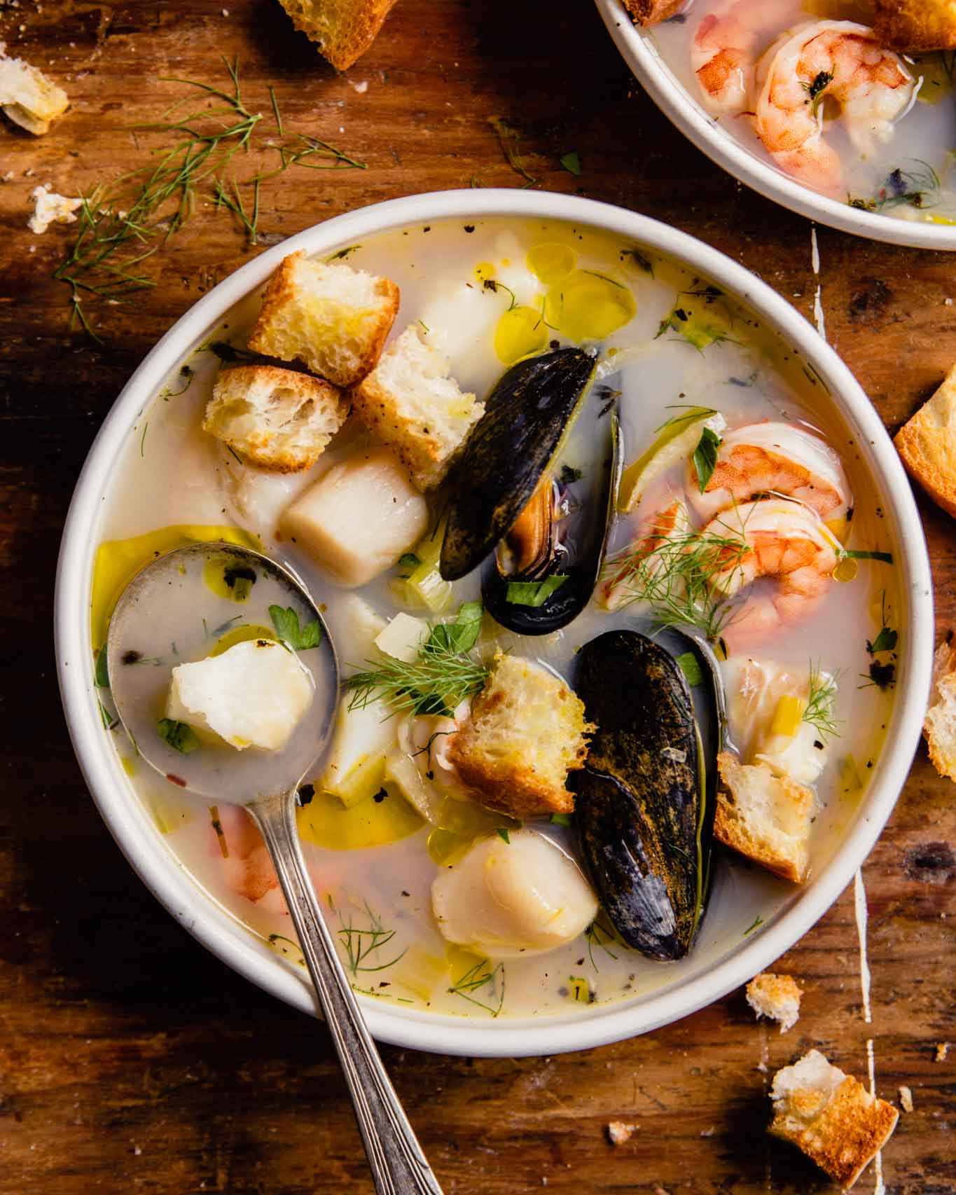 Can seafood soup be reheated?