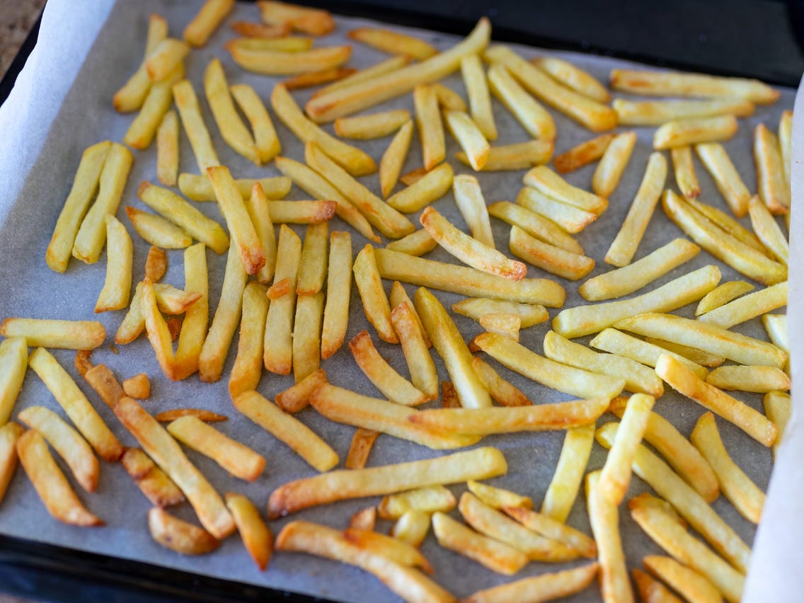 Can you add oil to frozen French fries?