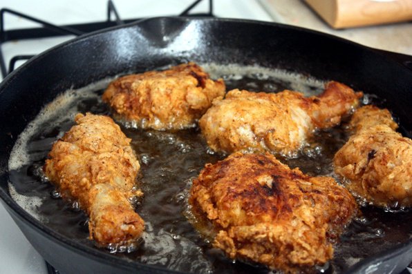 Can you add water when frying chicken?