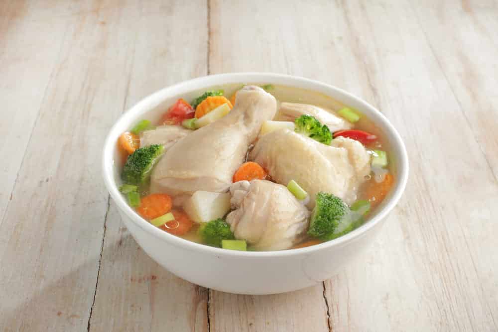 Can you boil raw chicken in soup?