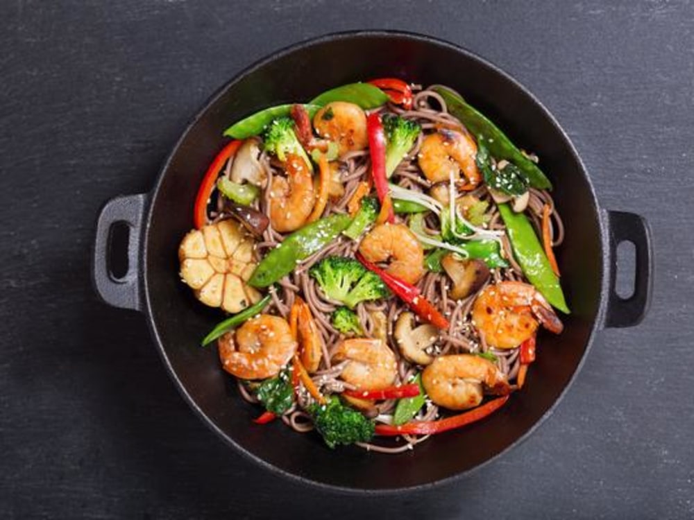 Can you cook frozen cooked prawns in a wok?