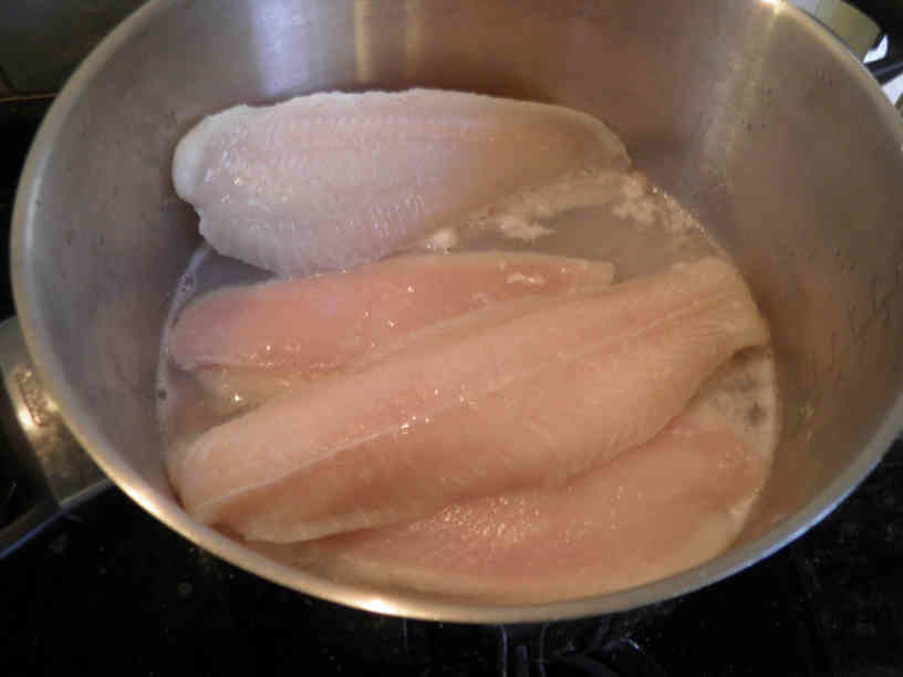 Can you cook frozen fish in a sauce?