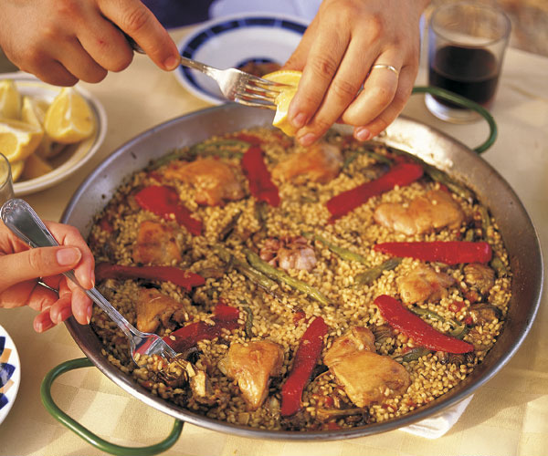 Can you cook paella rice in water?