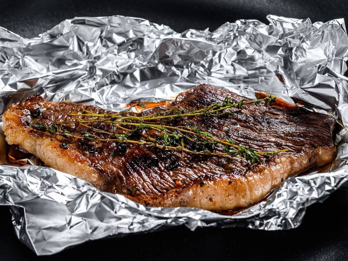 Can you cook steak in aluminum foil?