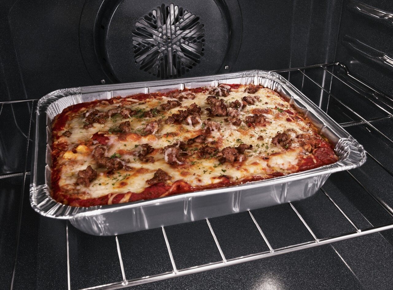 Can you cook with aluminum foil in a convection oven?