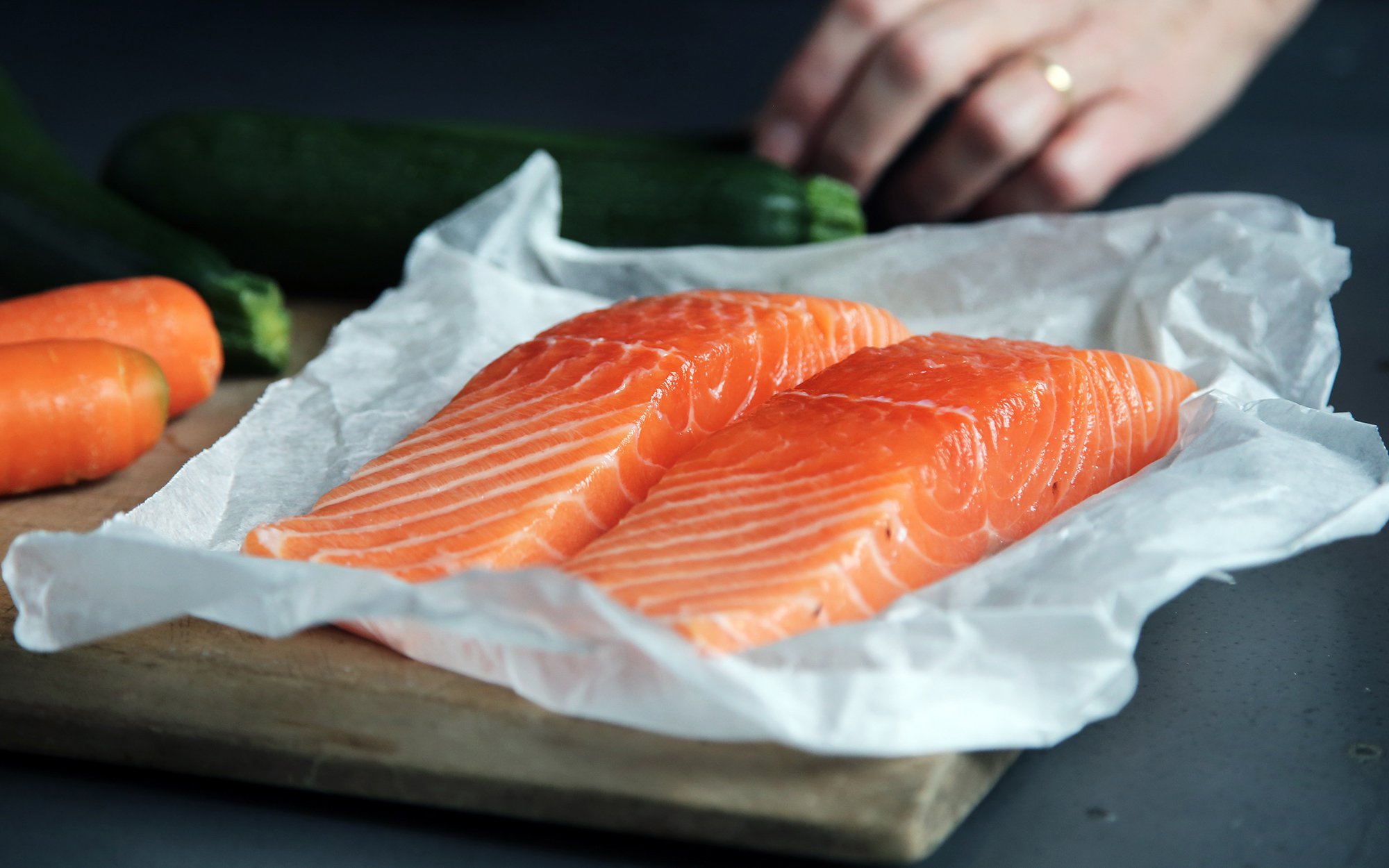 Can you eat too much farm raised salmon?