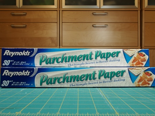 Can you put parchment paper over Teflon Paper?