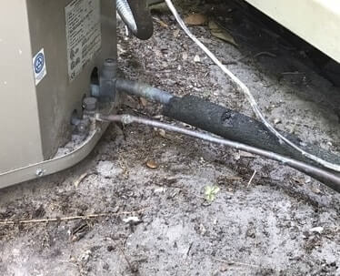 Can you smell a refrigerant leak in AC?