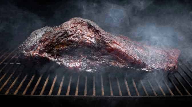 Can you start a brisket on the grill and finish in the oven?