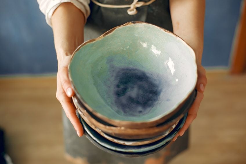 Can you use acrylic paint on fired clay?