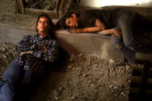 Did Johnny and Ponyboy both fell asleep in the church?