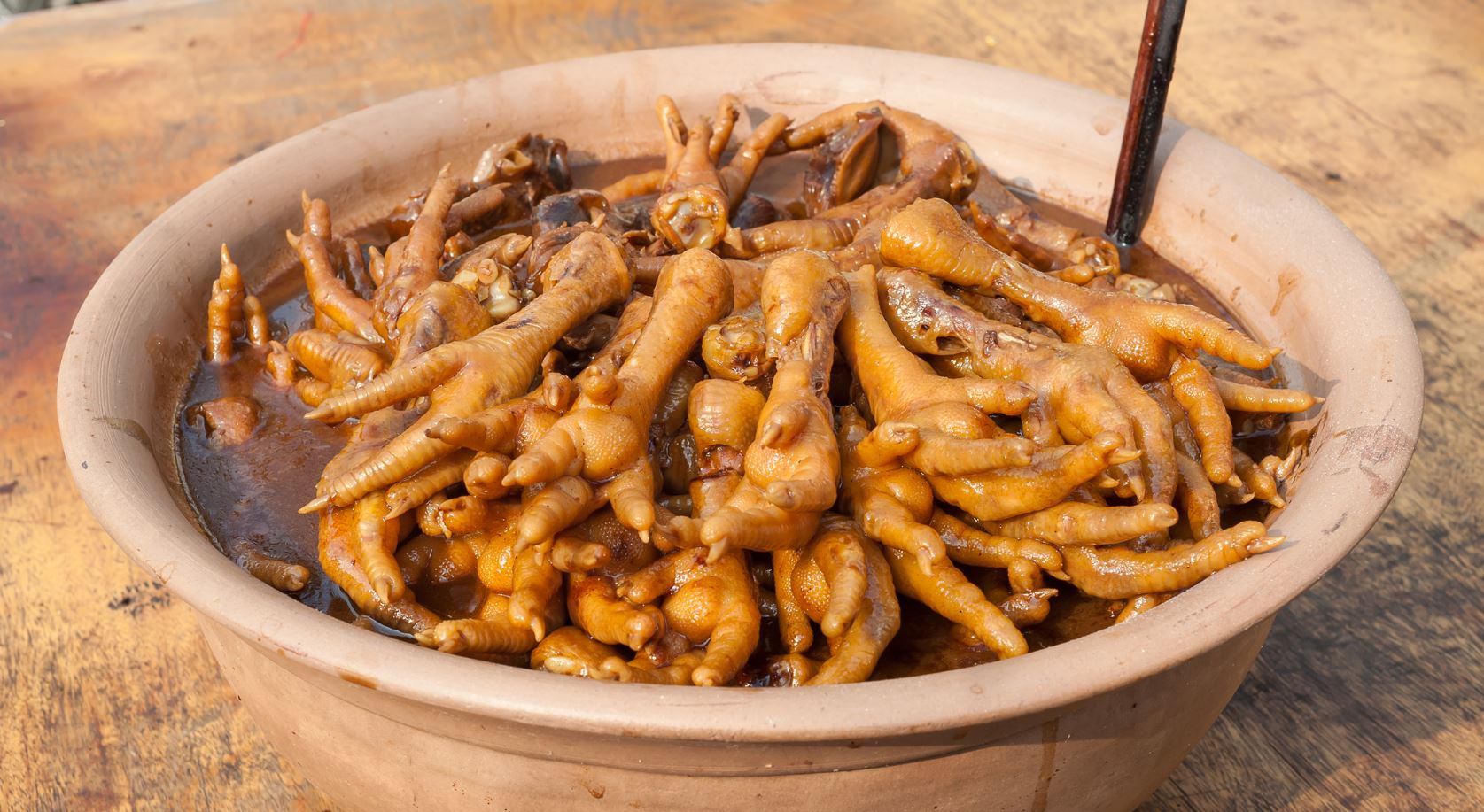 Do humans eat chicken feet?