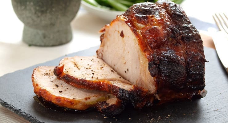 Do I cover pork shoulder while cooking?