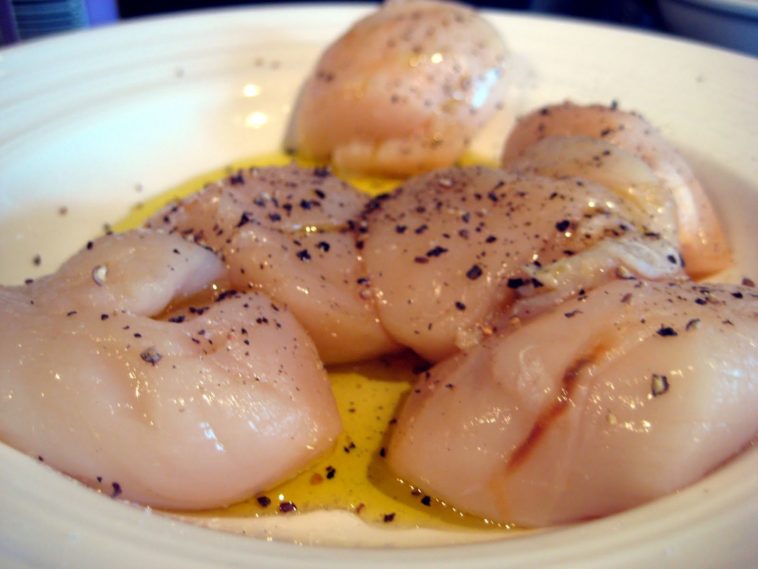 Do undercooked scallops make you sick?