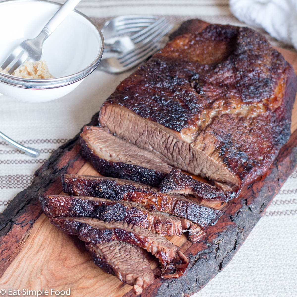 Do you add water when cooking brisket in the oven?