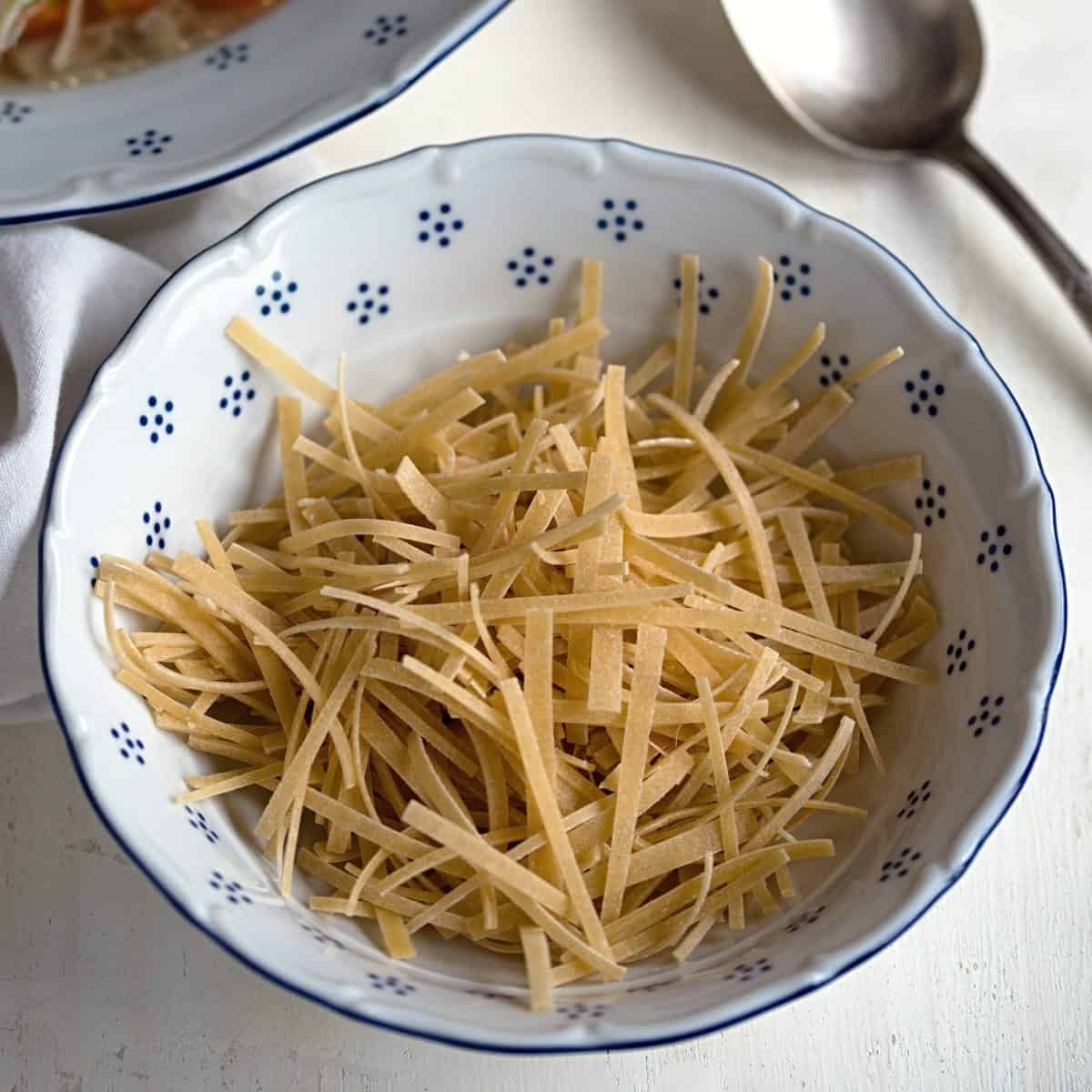 Do you cook egg noodles before putting them in soup?