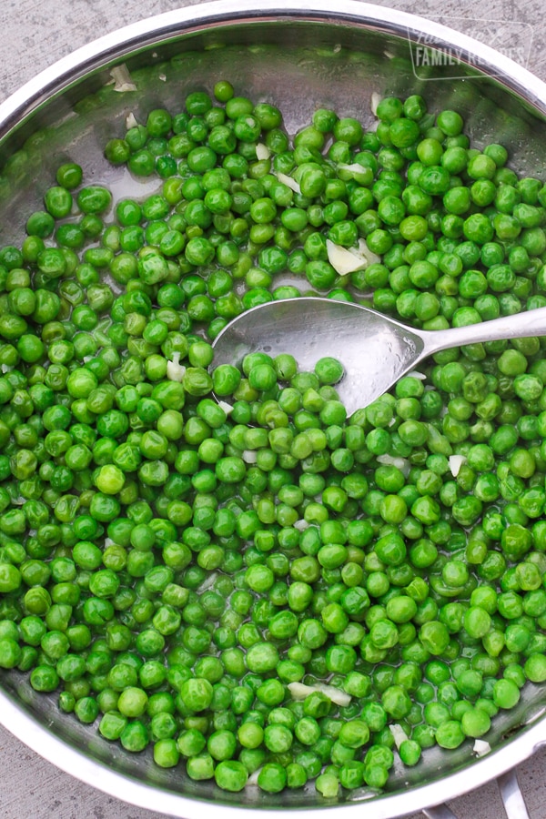 Do you cook frozen peas in water?