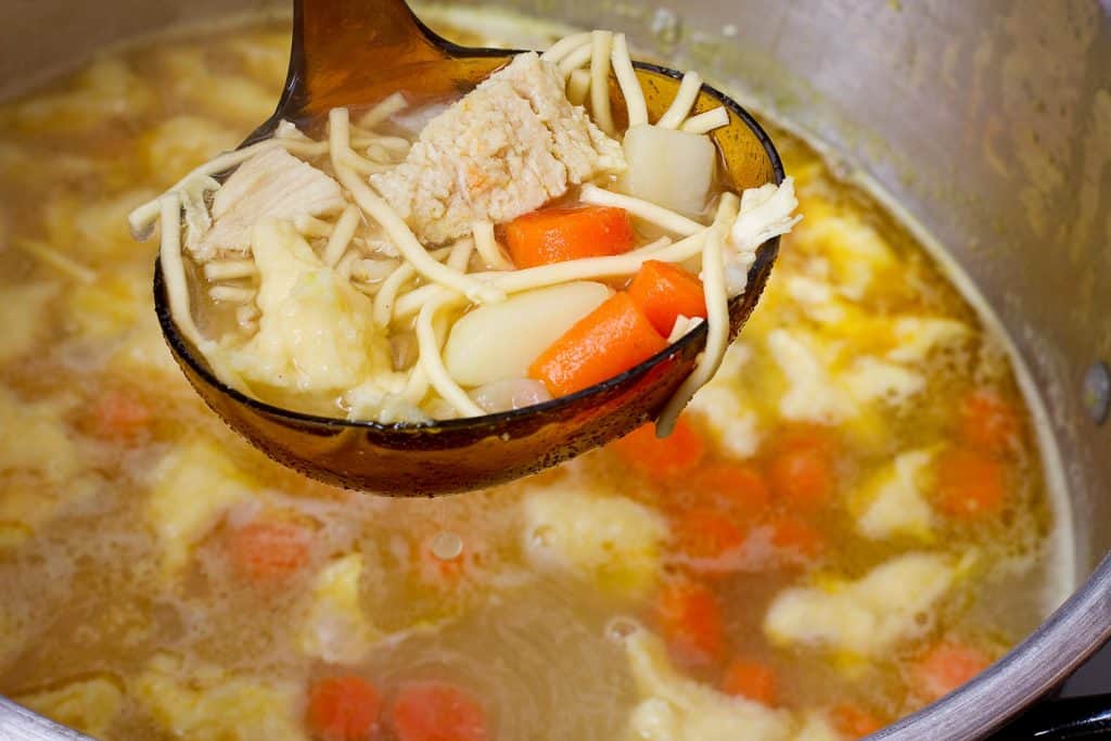 Do you cook potatoes before adding to soup?