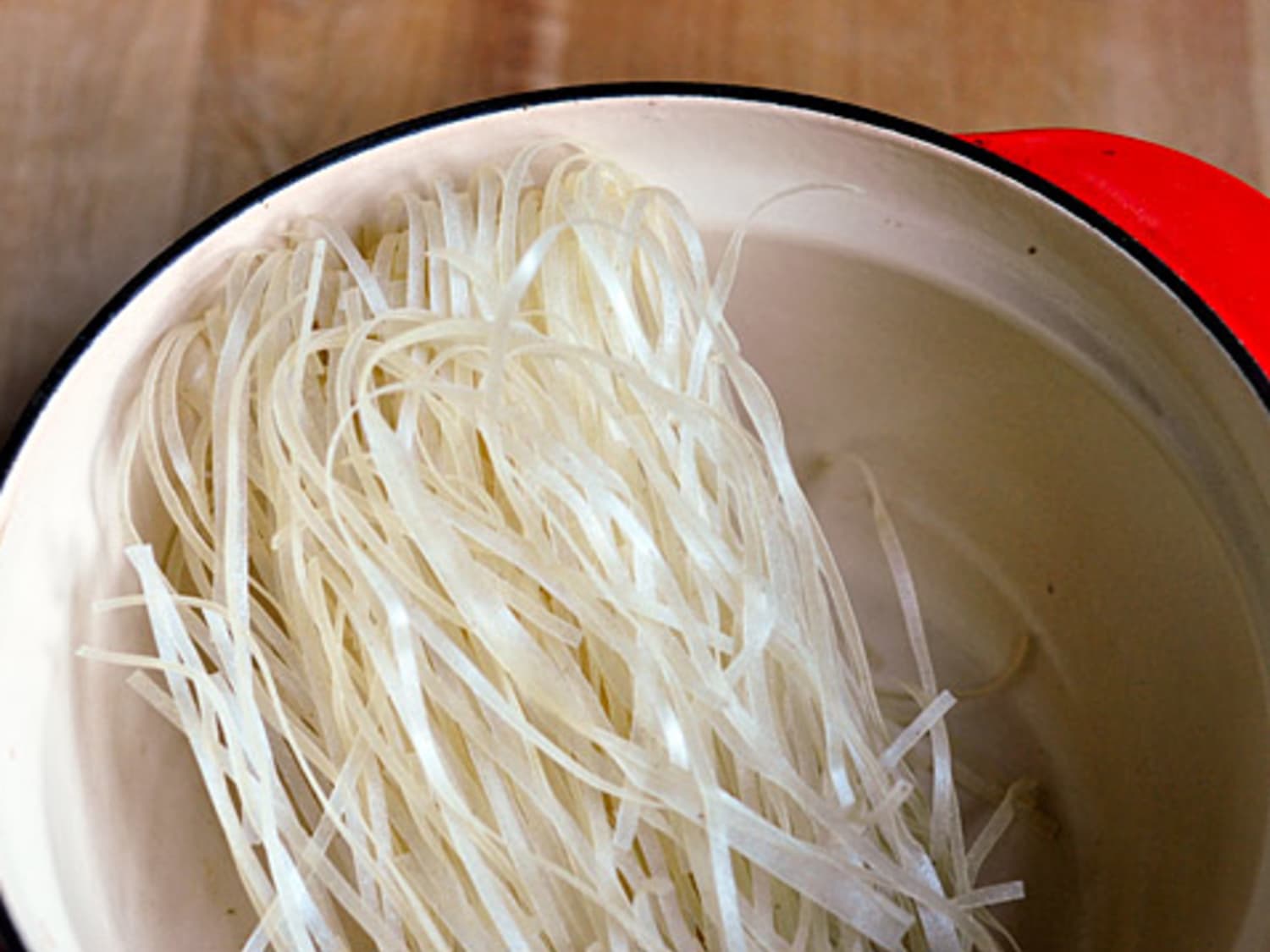Do you cook rice noodles before adding to soup?