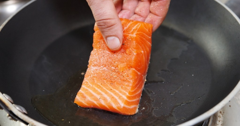 Do you cook salmon skin side up or down first?