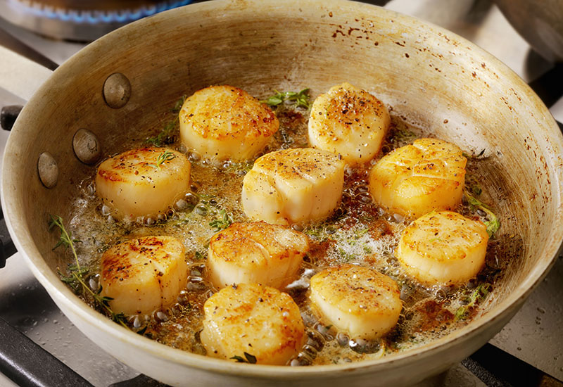 Do you cook scallops fast or slow?