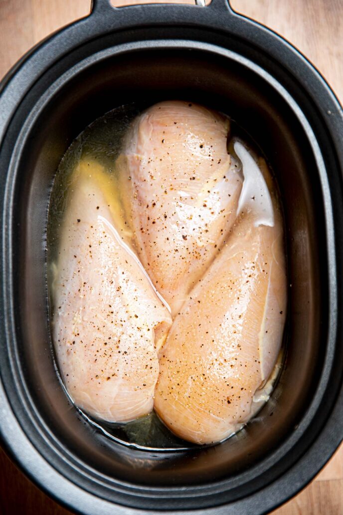 Do you cover chicken with liquid to crock pot?