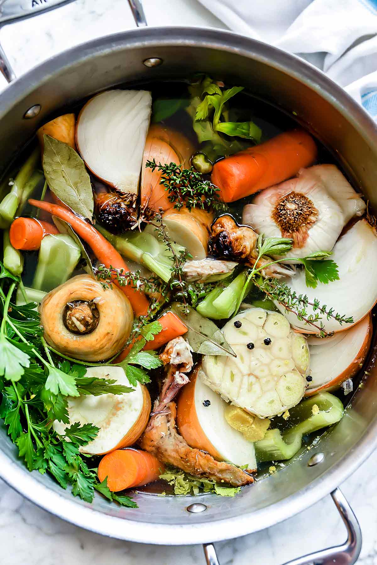 Do you cover when making chicken stock?