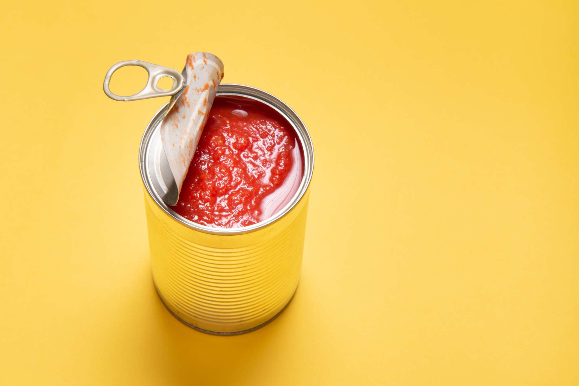 Do you drain the liquid from canned tomatoes?