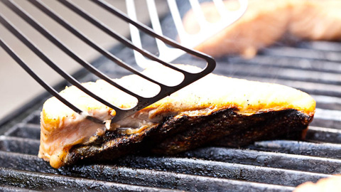 Do you flip fish when grilling?