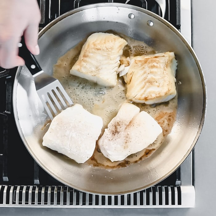 Do you flip fish when pan frying?