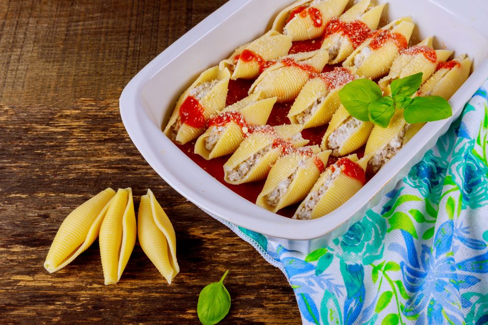 Do you freeze stuffed shells before or after cooking?