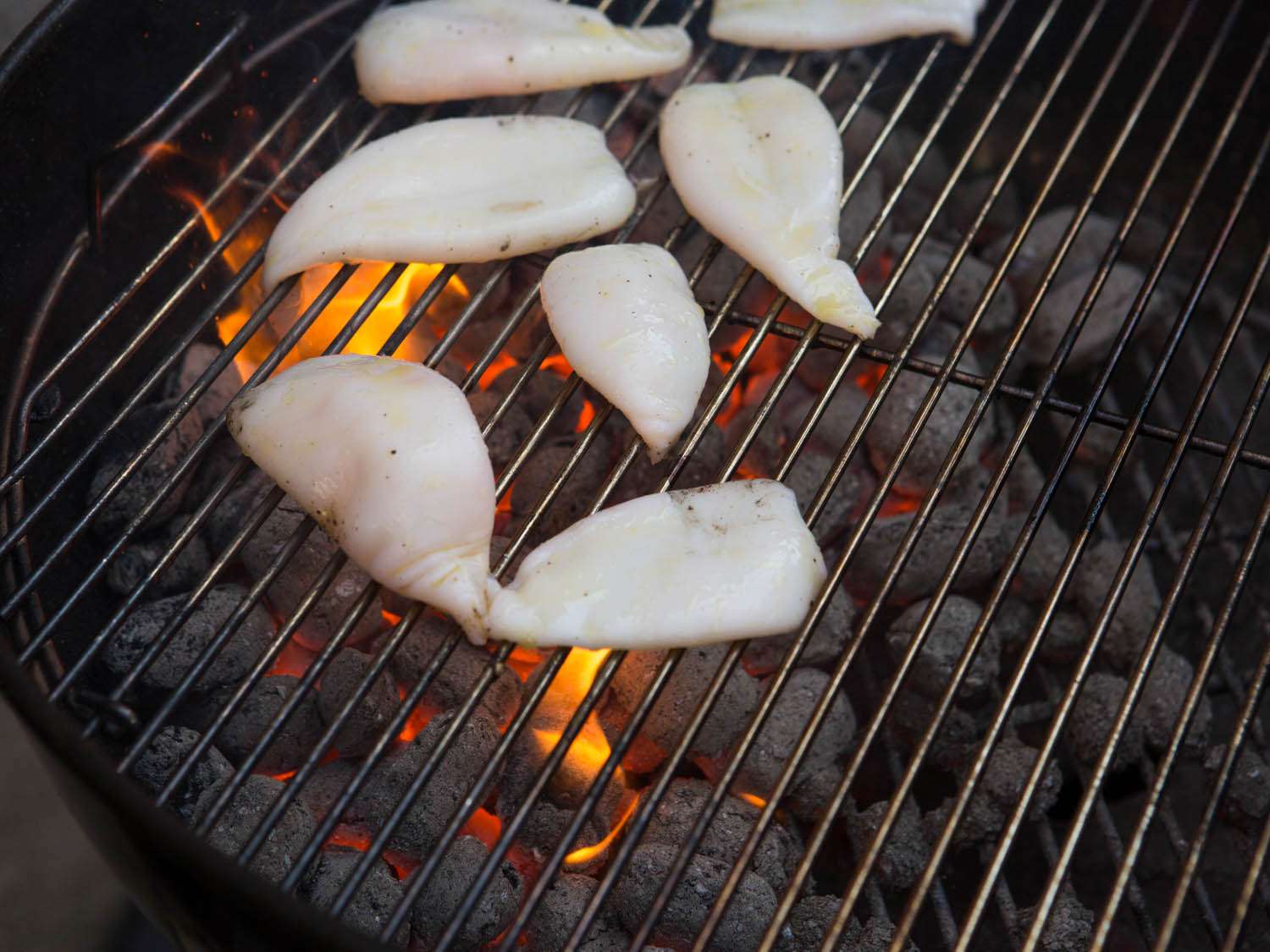 Do you have to boil squid before grilling?