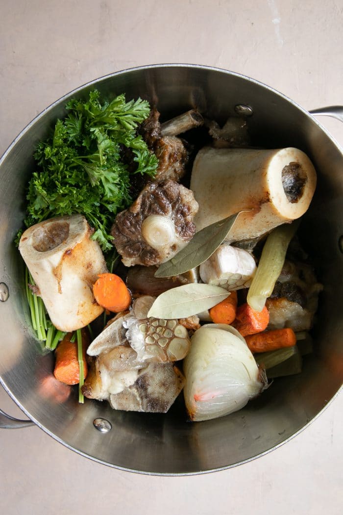 Do you have to cook beef bones before making broth?
