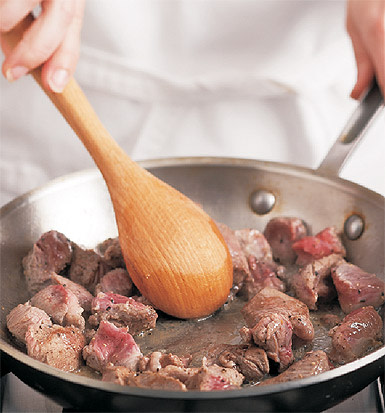Do you need to brown meat before slow cooking?