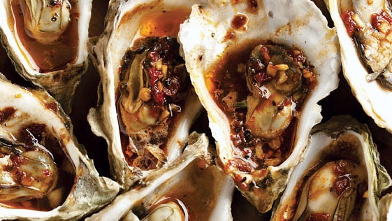 Do you open oysters before grilling?