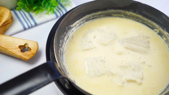 Do you poach fish in milk or water?