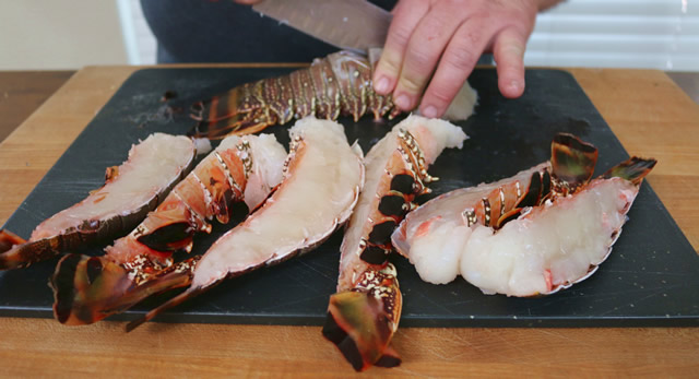 Do you split lobster tails before grilling?