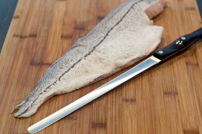 Do you take skin off fish before frying?