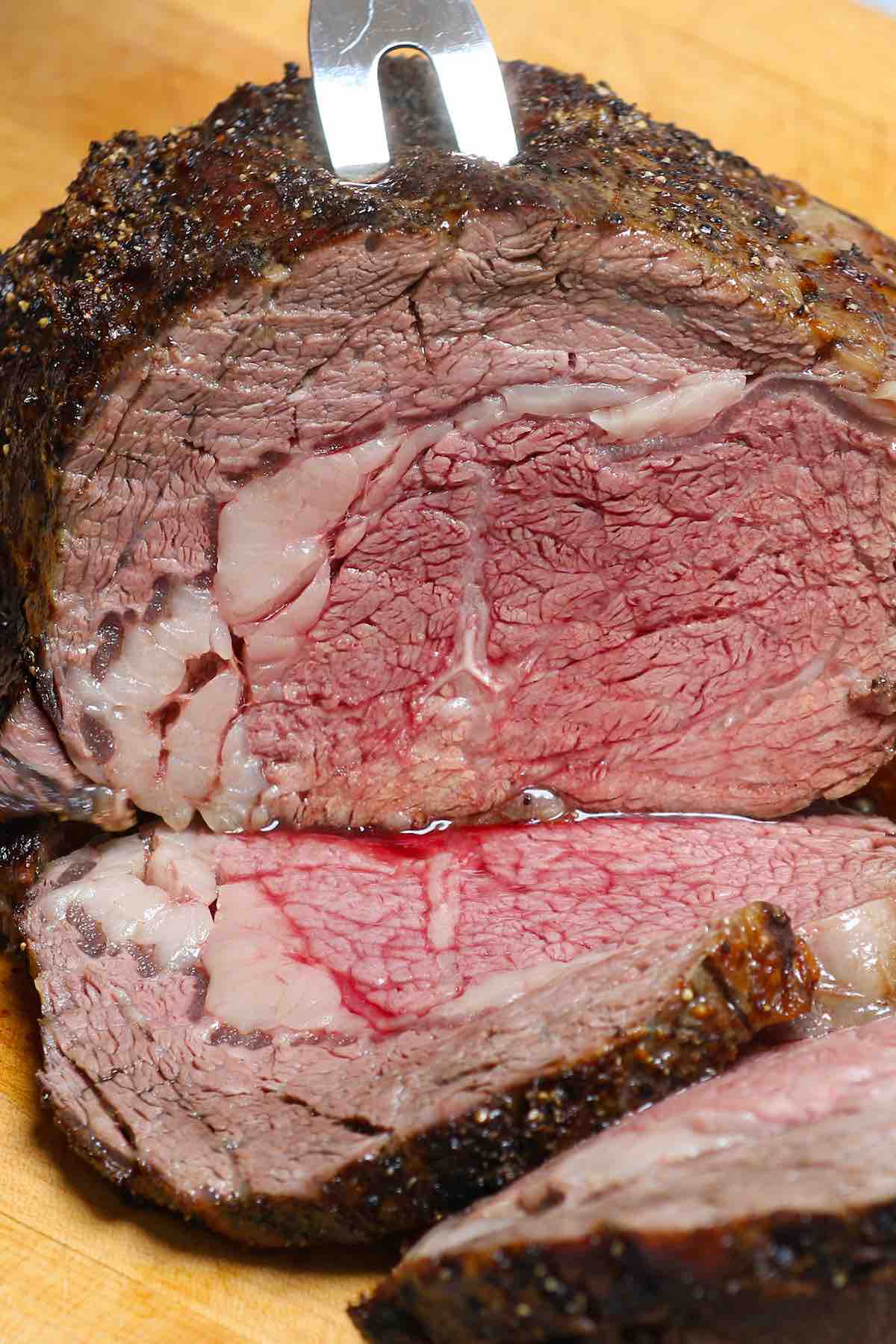 Does a bone-in roast cook faster than a boneless roast?